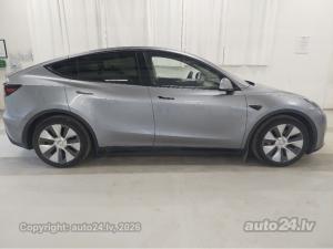 Grey Tesla Model Y 2023 in Tallinn, with an engine capacity of 0.00 L and mileage of 52 thousand km for 39990 €, photo 6 on AUTOMOTO.COM.LV