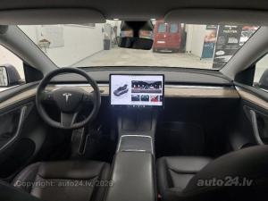 Grey Tesla Model Y 2023 in Tallinn, with an engine capacity of 0.00 L and mileage of 52 thousand km for 39990 €, photo 7 on AUTOMOTO.COM.LV