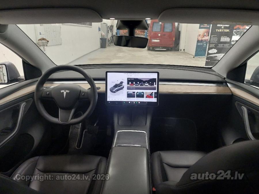 Grey Tesla Model Y 2023 in Tallinn, with an engine capacity of 0.00 L and mileage of 52 thousand km for 39990 €, photo 7 on AUTOMOTO.COM.LV
