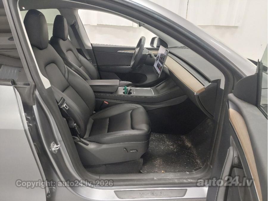 Grey Tesla Model Y 2023 in Tallinn, with an engine capacity of 0.00 L and mileage of 52 thousand km for 39990 €, photo 8 on AUTOMOTO.COM.LV
