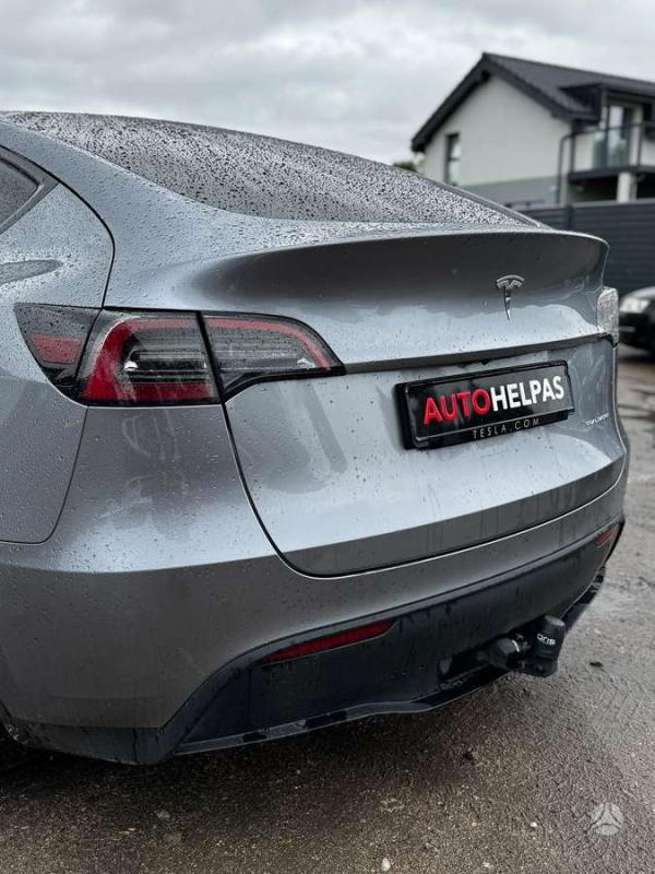 Grey Tesla Model Y 2024 in Klaipeda, with an engine capacity of 0.00 L and mileage of 21 thousand km for 37500 €, photo 6 on AUTOMOTO.COM.LV