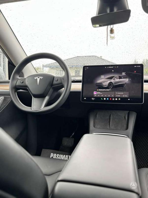 Grey Tesla Model Y 2024 in Klaipeda, with an engine capacity of 0.00 L and mileage of 21 thousand km for 37500 €, photo 8 on AUTOMOTO.COM.LV