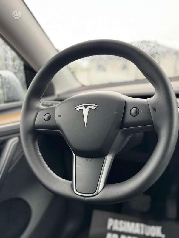 Grey Tesla Model Y 2024 in Klaipeda, with an engine capacity of 0.00 L and mileage of 21 thousand km for 37500 €, photo 10 on AUTOMOTO.COM.LV