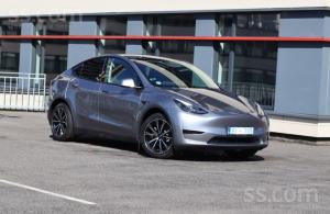 Grey Tesla Model Y 2024 in Riga, with an engine capacity of 0.00 L and mileage of 41 thousand km for 30980 €, photo  on AUTOMOTO.COM.LV