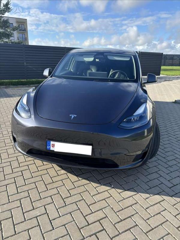 Grey Tesla Model Y 2025 in Klaipeda, with an engine capacity of 0.00 L and mileage of 30 thousand km for 29900 €, photo 4 on AUTOMOTO.COM.LV