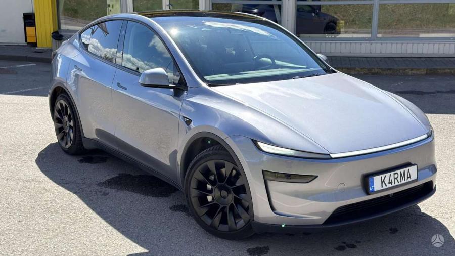 Grey Tesla Model Y 2025 in Jonava, with an engine capacity of 0.00 L and mileage of 25 thousand km for 51000 €, photo 3 on AUTOMOTO.COM.LV