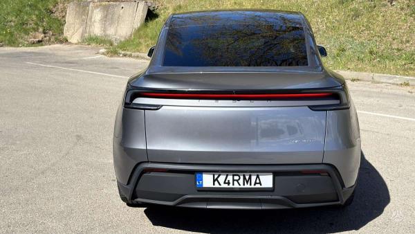 Grey Tesla Model Y 2025 in Jonava, with an engine capacity of 0.00 L and mileage of 25 thousand km for 51000 €, photo 6 on AUTOMOTO.COM.LV