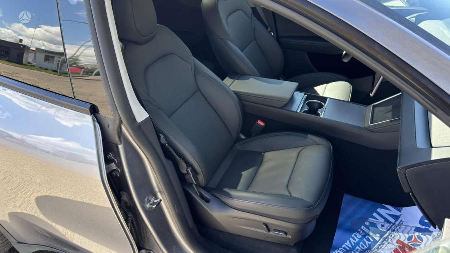 Grey Tesla Model Y 2025 in Jonava, with an engine capacity of 0.00 L and mileage of 25 thousand km for 51000 €, photo 15 on AUTOMOTO.COM.LV