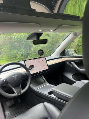 Pelēks Tesla Model Y 2023 Viļņa, ar dzinēja tilpumu 0.00 L un nobraukumu 53 tūkst. km par 28500 €, foto 25 vietnē AUTOMOTO.COM.LV