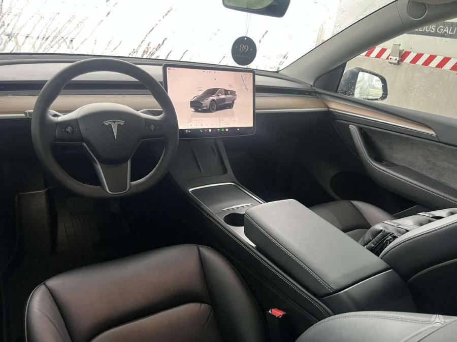 Pelēks Tesla Model Y 2023 Viļņa, ar dzinēja tilpumu 0.00 L un nobraukumu 54 tūkst. km par 27900 €, foto 23 vietnē AUTOMOTO.COM.LV