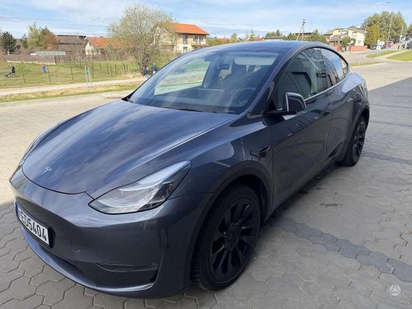 Grey Tesla Model Y 2023 in Vilnius, with an engine capacity of 0.00 L and mileage of 54 thousand km for 26900 €, photo 5 on AUTOMOTO.COM.LV