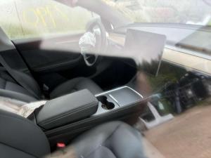Grey Tesla Model Y 2023 in Kaunas, with an engine capacity of 0.00 L and mileage of 43 thousand km for 15700 €, photo 5 on AUTOMOTO.COM.LV