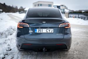 Grey Tesla Model Y 2023 in Tallinn, with an engine capacity of 0.00 L and mileage of 55 thousand km for 32000 €, photo 7 on AUTOMOTO.COM.LV