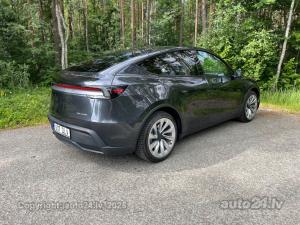 Grey Tesla Model Y 2025 in Tallinn, with an engine capacity of 0.00 L and mileage of 27 thousand km for 54900 €, photo 6 on AUTOMOTO.COM.LV