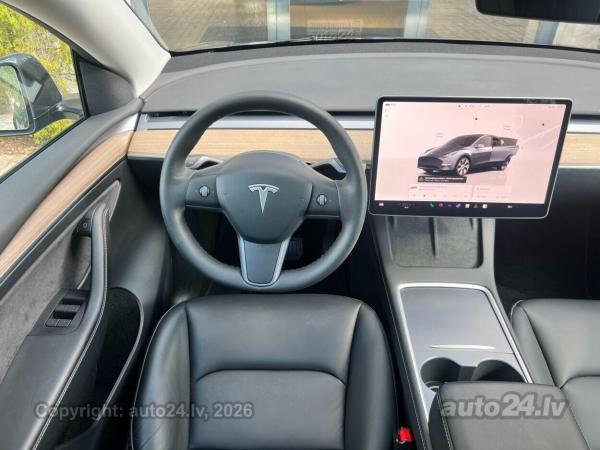 Tesla Model Y 2022 in Tallinn, with an engine capacity of 0.00 L and mileage of 58 thousand km for 36990 €, photo 3 on AUTOMOTO.COM.LV