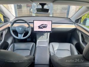 Tesla Model Y 2022 in Tallinn, with an engine capacity of 0.00 L and mileage of 58 thousand km for 36990 €, photo 4 on AUTOMOTO.COM.LV