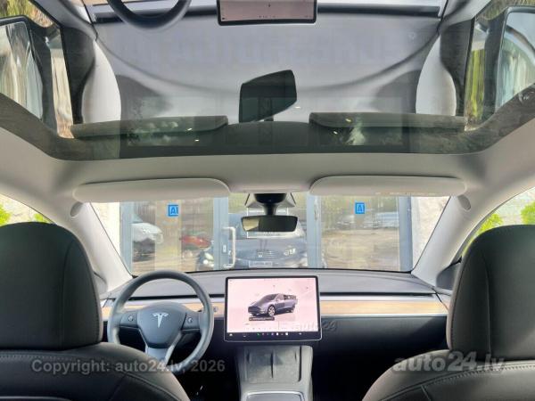 Tesla Model Y 2022 in Tallinn, with an engine capacity of 0.00 L and mileage of 58 thousand km for 36990 €, photo 5 on AUTOMOTO.COM.LV
