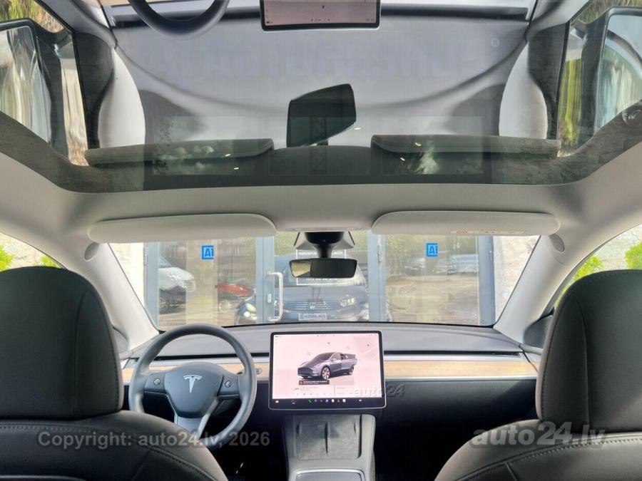 Tesla Model Y 2022 in Tallinn, with an engine capacity of 0.00 L and mileage of 58 thousand km for 36990 €, photo 5 on AUTOMOTO.COM.LV