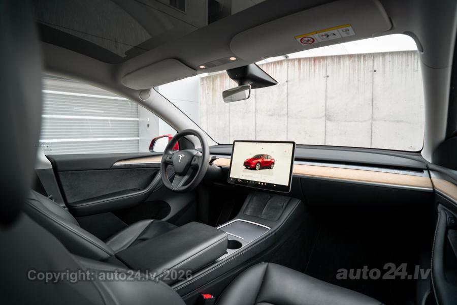 Tesla Model Y 2023 in Tartu, with an engine capacity of 0.00 L and mileage of 77 thousand km for 33900 €, photo 4 on AUTOMOTO.COM.LV
