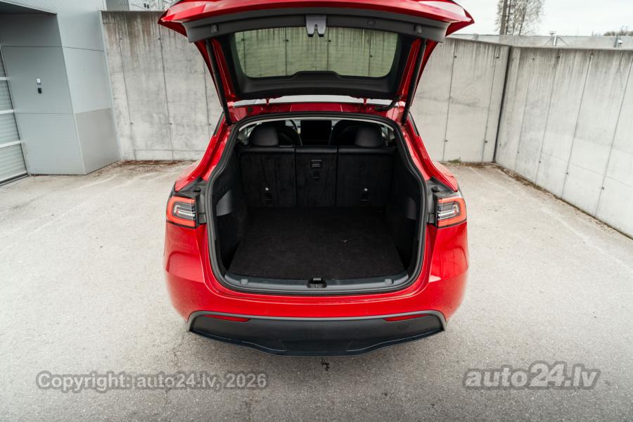 Tesla Model Y 2023 in Tartu, with an engine capacity of 0.00 L and mileage of 77 thousand km for 33900 €, photo 7 on AUTOMOTO.COM.LV