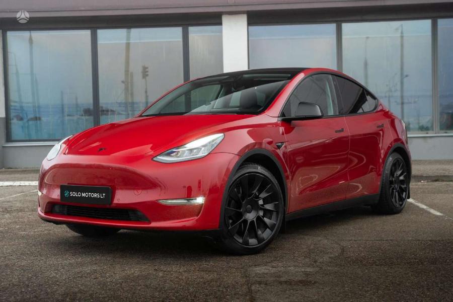 Red Tesla Model Y 2022 in Vilnius, with an engine capacity of 0.00 L and mileage of 54 thousand km for 27000 €, photo 1 on AUTOMOTO.COM.LV