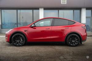 Red Tesla Model Y 2022 in Vilnius, with an engine capacity of 0.00 L and mileage of 54 thousand km for 27000 €, photo 2 on AUTOMOTO.COM.LV