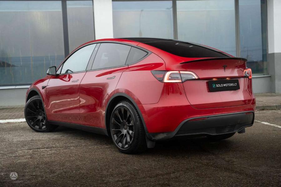 Red Tesla Model Y 2022 in Vilnius, with an engine capacity of 0.00 L and mileage of 54 thousand km for 27000 €, photo 3 on AUTOMOTO.COM.LV