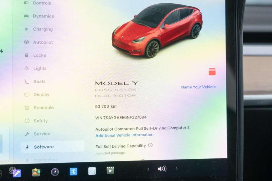 Red Tesla Model Y 2022 in Vilnius, with an engine capacity of 0.00 L and mileage of 54 thousand km for 27000 €, photo 23 on AUTOMOTO.COM.LV
