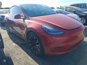 Sarkans Tesla Model Y 2022 Viļņa, ar dzinēja tilpumu 0.00 L un nobraukumu 114 tūkst. km par 20900 €, foto  vietnē AUTOMOTO.COM.LV