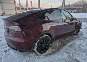 Red Tesla Model Y 2023 in Klaipeda, with an engine capacity of 0.00 L and mileage of 48 thousand km for 11700 €, photo 2 on AUTOMOTO.COM.LV