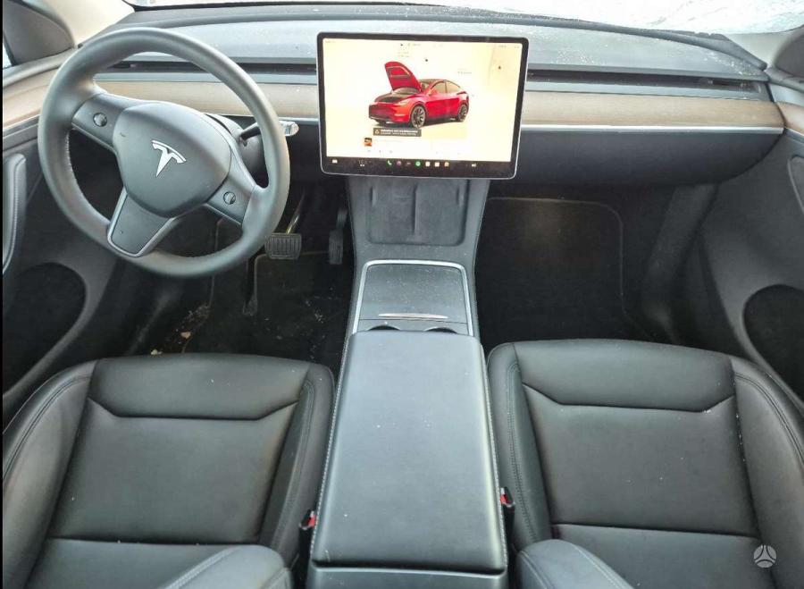 Red Tesla Model Y 2023 in Klaipeda, with an engine capacity of 0.00 L and mileage of 48 thousand km for 11700 €, photo 5 on AUTOMOTO.COM.LV