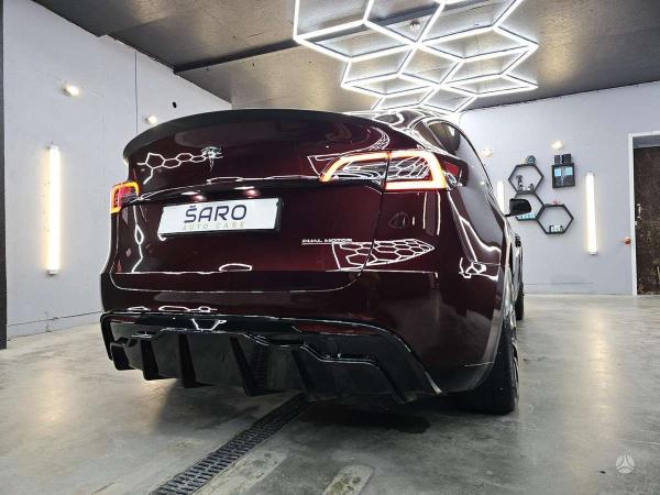 Sarkans Tesla Model Y 2023 Mažeikiai, ar dzinēja tilpumu 0.00 L un nobraukumu 34 tūkst. km par 36000 €, foto 5 vietnē AUTOMOTO.COM.LV