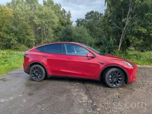 Sarkans Tesla Model Y 2023 Rīga, ar dzinēja tilpumu 0.00 L un nobraukumu 53 tūkst. km par 37000 €, foto 5 vietnē AUTOMOTO.COM.LV