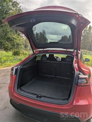 Sarkans Tesla Model Y 2023 Rīga, ar dzinēja tilpumu 0.00 L un nobraukumu 53 tūkst. km par 37000 €, foto 9 vietnē AUTOMOTO.COM.LV