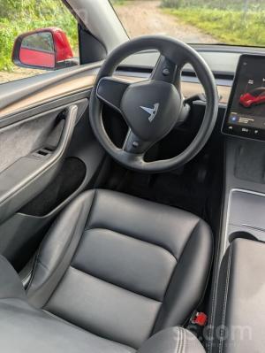 Sarkans Tesla Model Y 2023 Rīga, ar dzinēja tilpumu 0.00 L un nobraukumu 53 tūkst. km par 37000 €, foto 10 vietnē AUTOMOTO.COM.LV