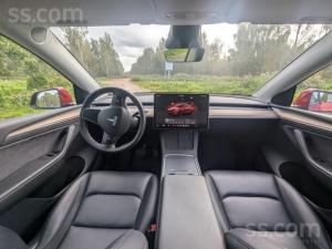 Sarkans Tesla Model Y 2023 Rīga, ar dzinēja tilpumu 0.00 L un nobraukumu 53 tūkst. km par 37000 €, foto 14 vietnē AUTOMOTO.COM.LV