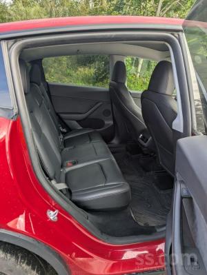 Sarkans Tesla Model Y 2023 Rīga, ar dzinēja tilpumu 0.00 L un nobraukumu 53 tūkst. km par 37000 €, foto 15 vietnē AUTOMOTO.COM.LV
