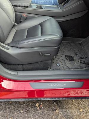 Sarkans Tesla Model Y 2023 Rīga, ar dzinēja tilpumu 0.00 L un nobraukumu 53 tūkst. km par 37000 €, foto 17 vietnē AUTOMOTO.COM.LV