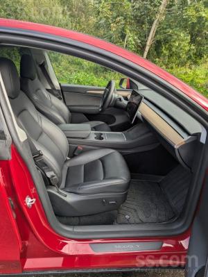 Sarkans Tesla Model Y 2023 Rīga, ar dzinēja tilpumu 0.00 L un nobraukumu 53 tūkst. km par 37000 €, foto 18 vietnē AUTOMOTO.COM.LV