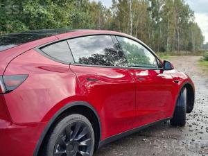 Sarkans Tesla Model Y 2023 Rīga, ar dzinēja tilpumu 0.00 L un nobraukumu 53 tūkst. km par 37000 €, foto 19 vietnē AUTOMOTO.COM.LV