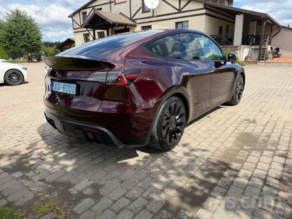 Sarkans Tesla Model Y 2024 Rīga, ar dzinēja tilpumu 0.00 L un nobraukumu 32 tūkst. km par 39000 €, foto 2 vietnē AUTOMOTO.COM.LV