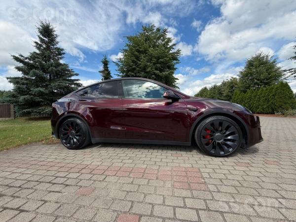 Sarkans Tesla Model Y 2024 Rīga, ar dzinēja tilpumu 0.00 L un nobraukumu 32 tūkst. km par 39000 €, foto 5 vietnē AUTOMOTO.COM.LV
