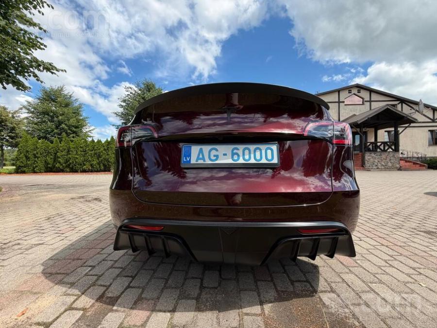 Sarkans Tesla Model Y 2024 Rīga, ar dzinēja tilpumu 0.00 L un nobraukumu 32 tūkst. km par 39000 €, foto 7 vietnē AUTOMOTO.COM.LV