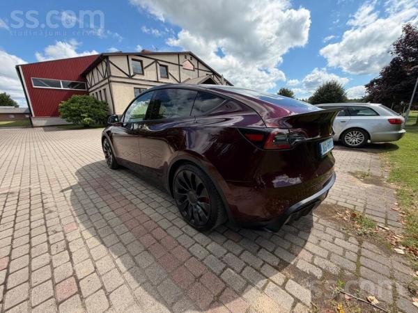 Sarkans Tesla Model Y 2024 Rīga, ar dzinēja tilpumu 0.00 L un nobraukumu 32 tūkst. km par 39000 €, foto 7 vietnē AUTOMOTO.COM.LV