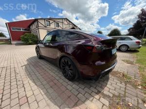 Sarkans Tesla Model Y 2024 Rīga, ar dzinēja tilpumu 0.00 L un nobraukumu 32 tūkst. km par 39000 €, foto 8 vietnē AUTOMOTO.COM.LV