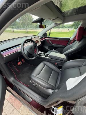 Sarkans Tesla Model Y 2024 Rīga, ar dzinēja tilpumu 0.00 L un nobraukumu 32 tūkst. km par 39000 €, foto 10 vietnē AUTOMOTO.COM.LV