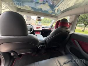Sarkans Tesla Model Y 2024 Rīga, ar dzinēja tilpumu 0.00 L un nobraukumu 32 tūkst. km par 39000 €, foto 12 vietnē AUTOMOTO.COM.LV