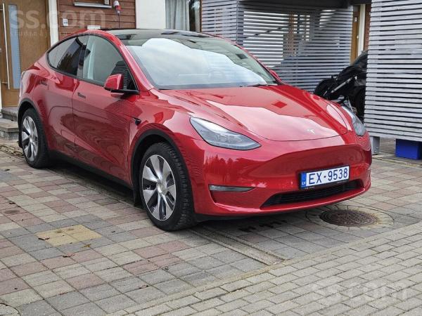 Red Tesla Model Y 2021 in Jurmala, with an engine capacity of 0.00 L and mileage of 62 thousand km for 32000 €, photo 2 on AUTOMOTO.COM.LV