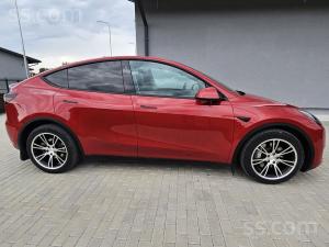 Sarkans Tesla Model Y 2021 Rīga, ar dzinēja tilpumu 0.00 L un nobraukumu 82 tūkst. km par 28800 €, foto 5 vietnē AUTOMOTO.COM.LV
