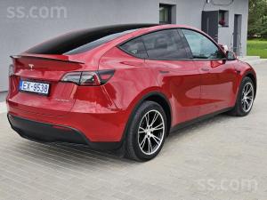 Sarkans Tesla Model Y 2021 Rīga, ar dzinēja tilpumu 0.00 L un nobraukumu 82 tūkst. km par 28800 €, foto 6 vietnē AUTOMOTO.COM.LV